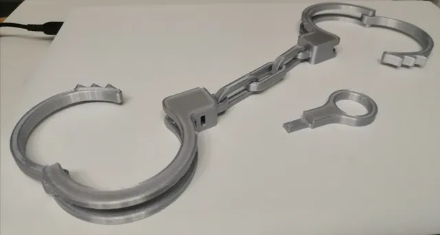 Print-in-place handcuffs by Maciek | Download free STL model ...
