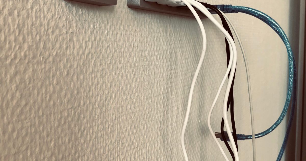 OpenSCAD USB cable storage for wall mount by kamkalian | Download free ...