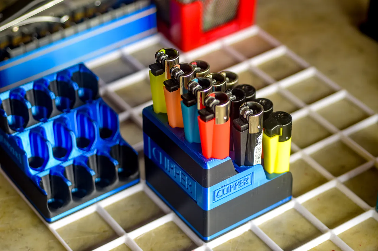 Gridfinity 2x2 Clipper Stand (12 lighters) by LexFran | Download free STL model | Printables.com