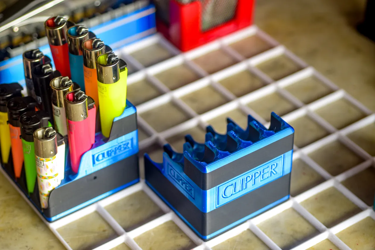 Gridfinity 2x2 Clipper Stand (12 lighters) by LexFran | Download free STL model | Printables.com