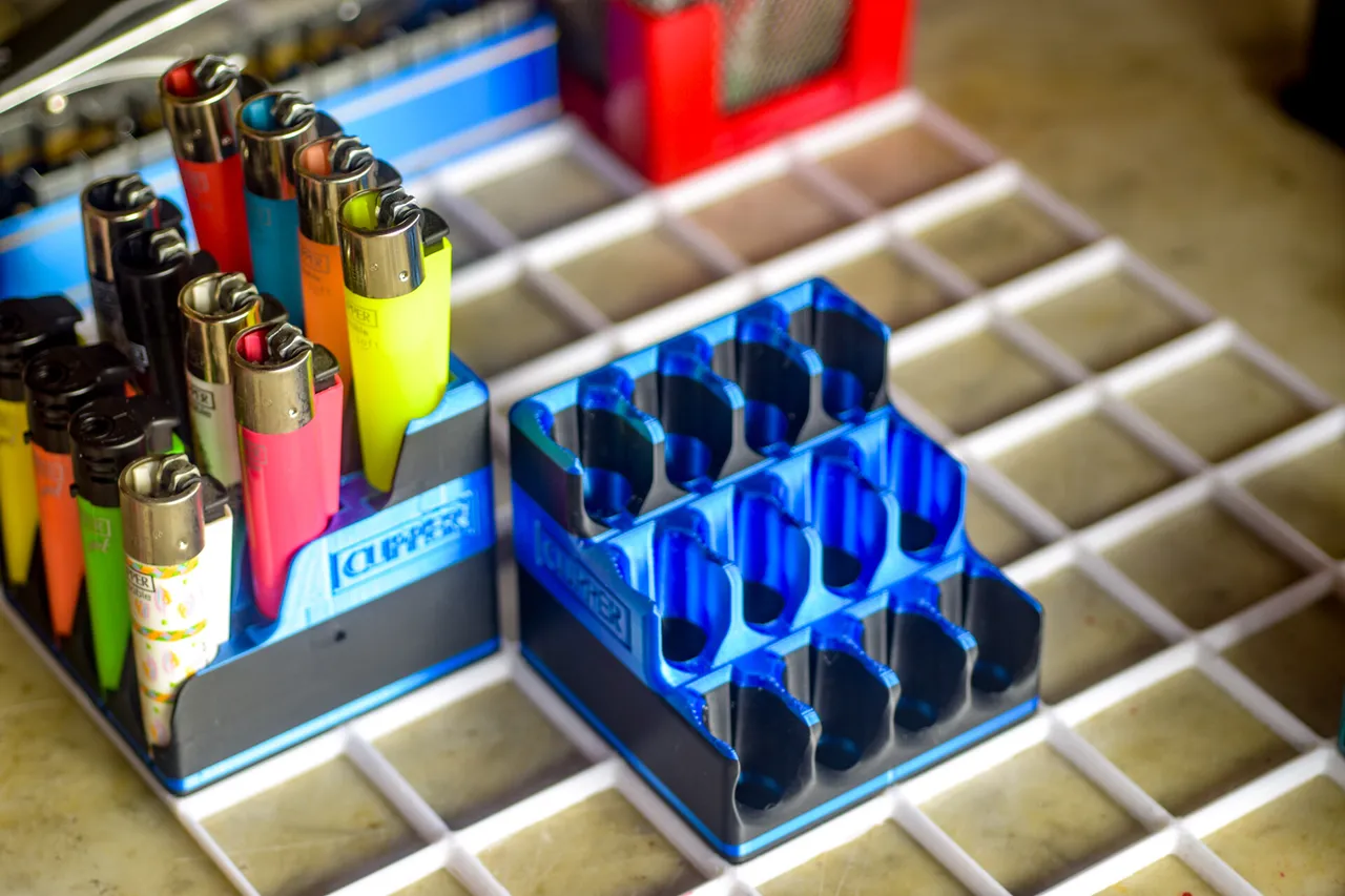 Gridfinity 2x2 Clipper Stand (12 lighters) by LexFran | Download free STL model | Printables.com