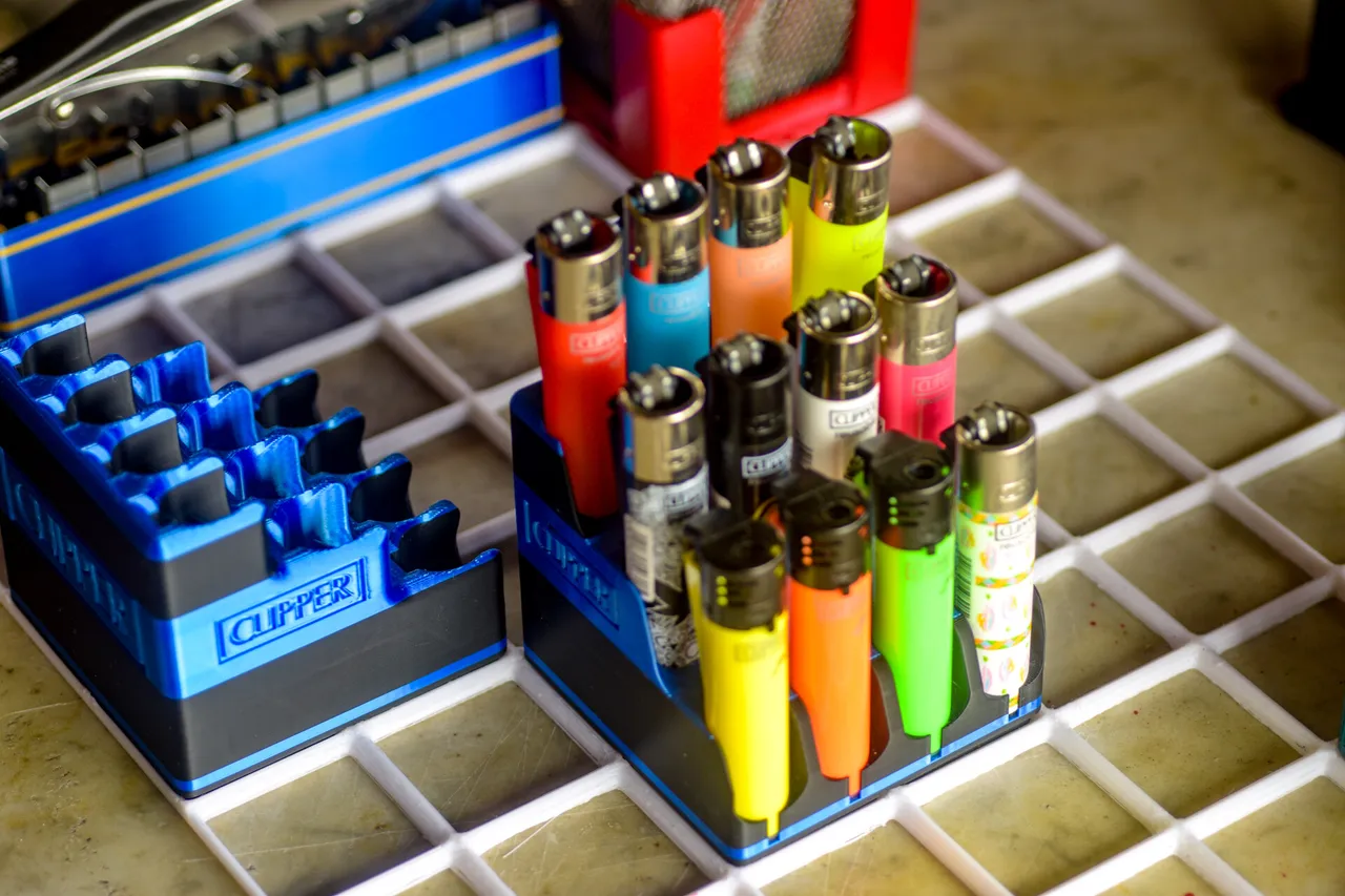 Gridfinity 2x2 Clipper Stand (12 lighters) by LexFran | Download free STL model | Printables.com
