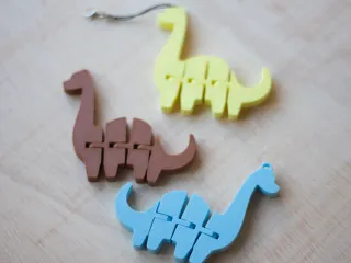 Flexi Dino Keychain Articulated by HekMaker | Download free STL model ...