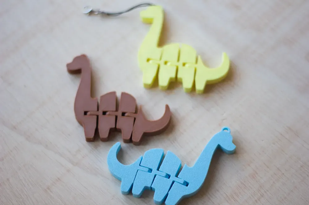 Flexi Dino Keychain Articulated by HekMaker | Download free STL model ...
