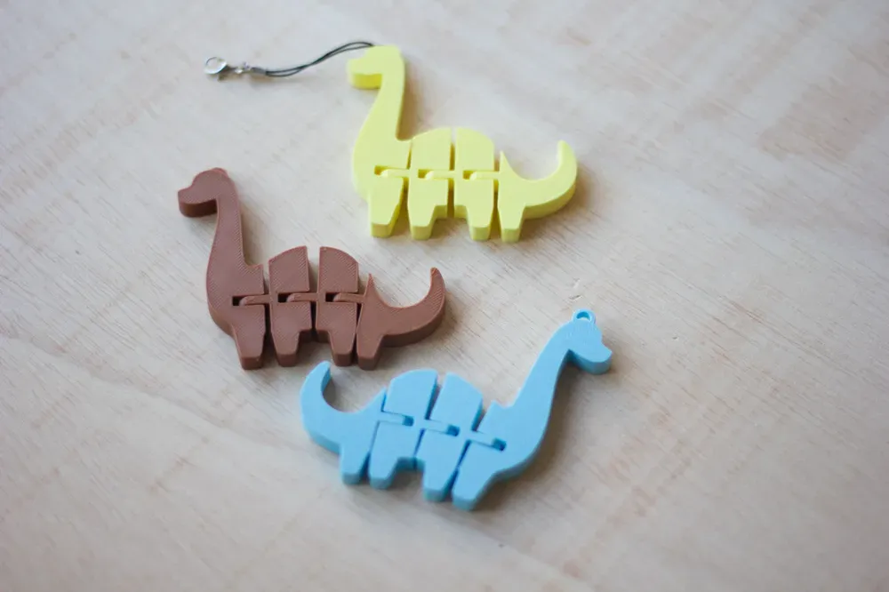 Flexi Dino Keychain Articulated by HekMaker | Download free STL model ...