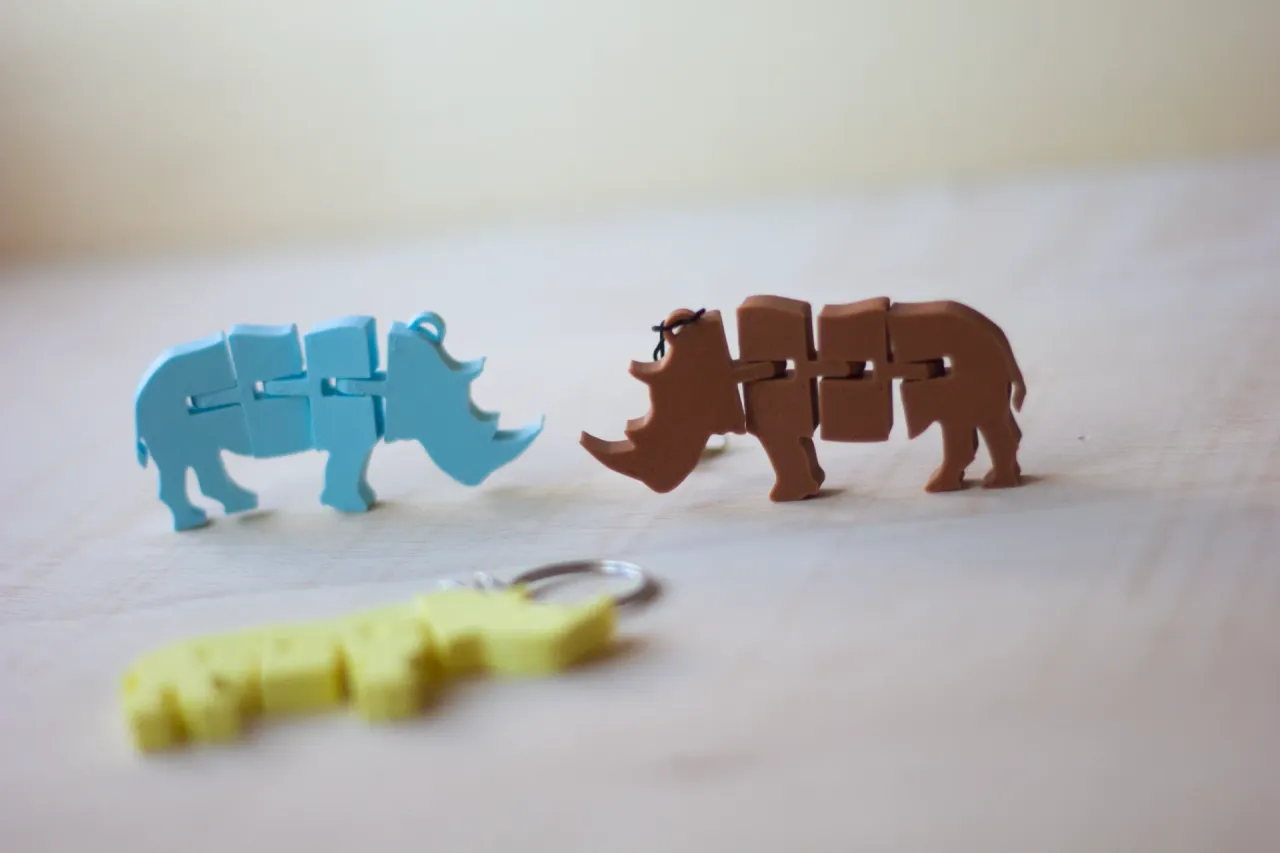 Flexi Rhinoceros Keychain Articulated by HekMaker | Download free STL ...