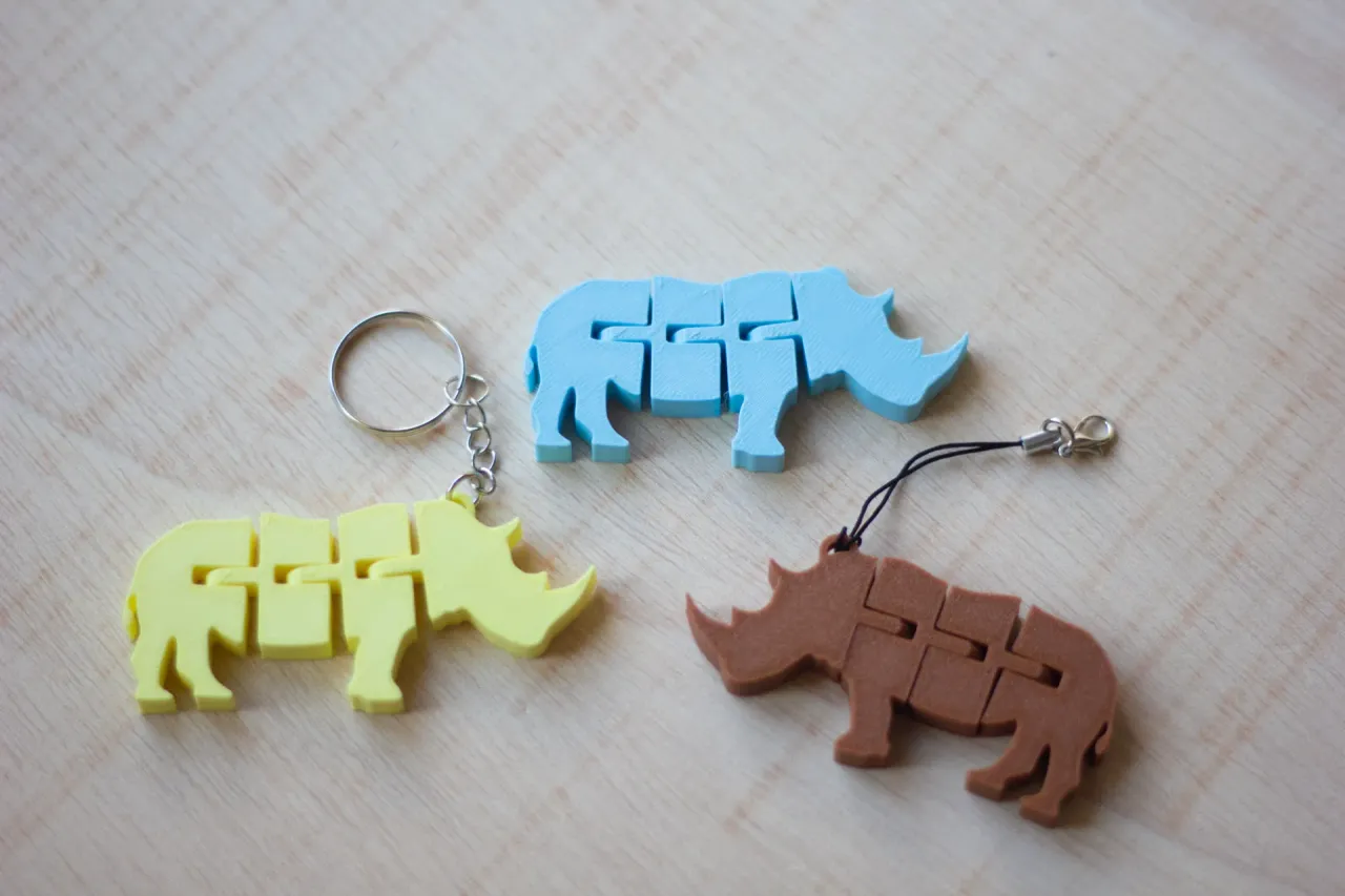 Flexi Rhinoceros Keychain Articulated by HekMaker | Download free STL ...