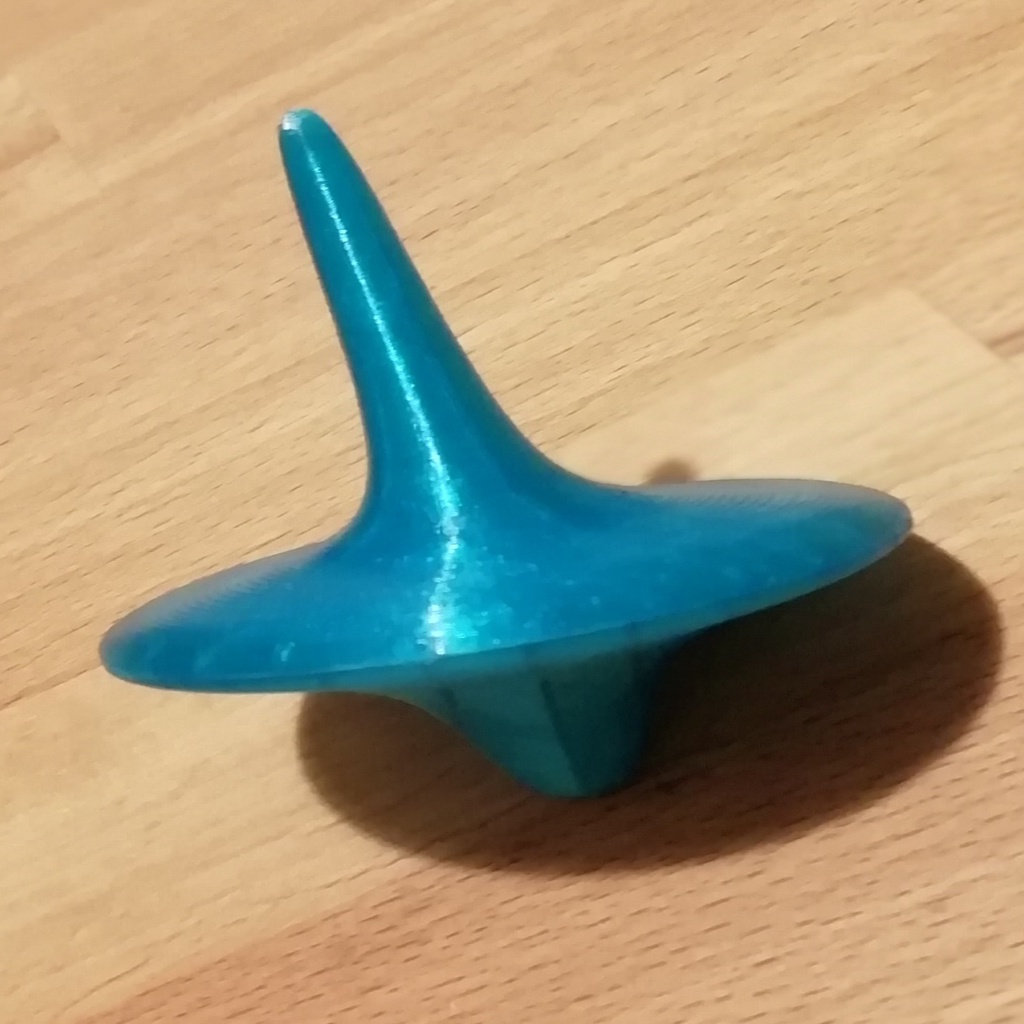 Yet another "Inception" style spinning top - split and weighed with 3 ...