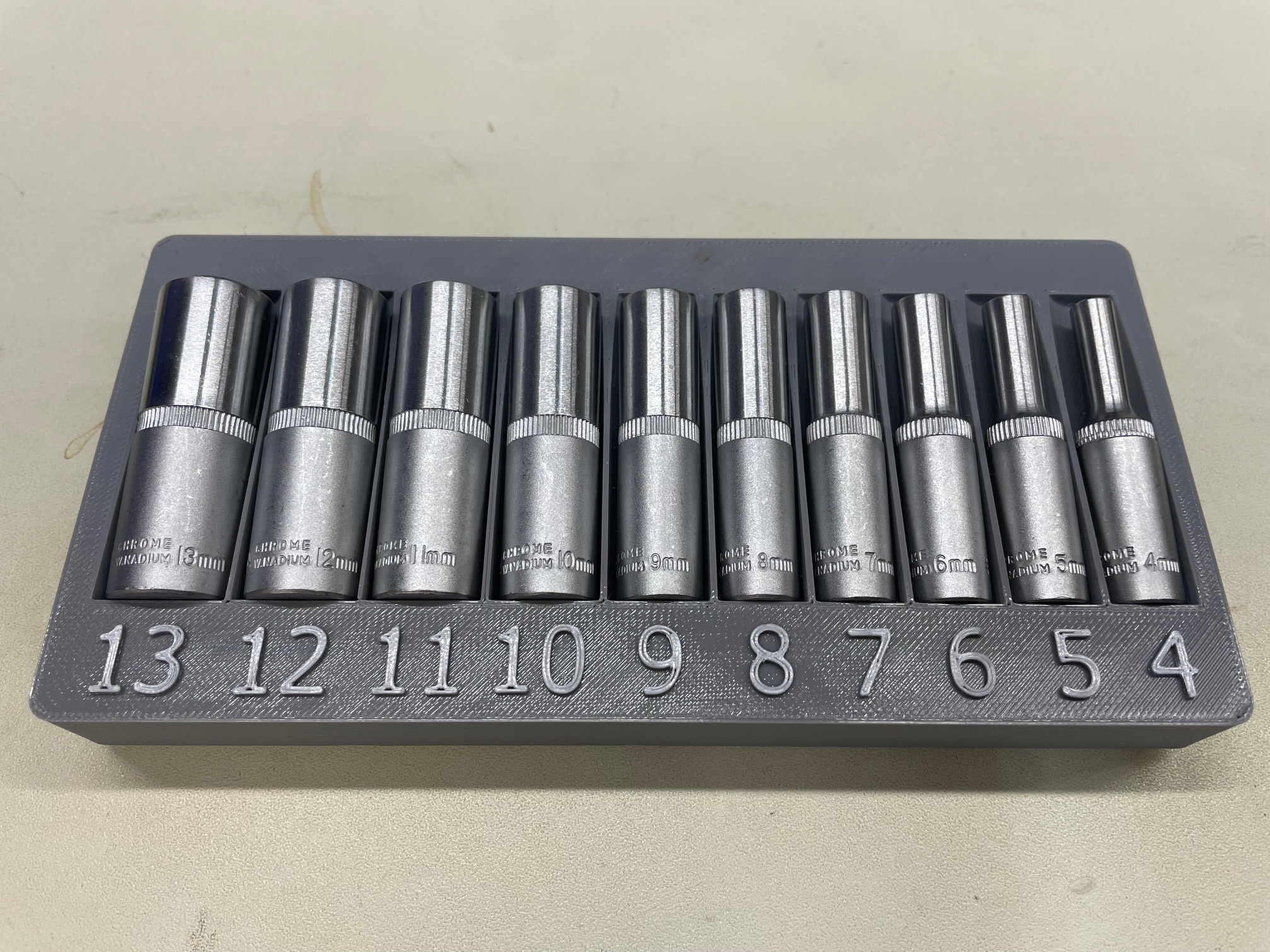 2x4 gridfinity long socket holder 4-13 metric with a 3/8" drive ratchet ...