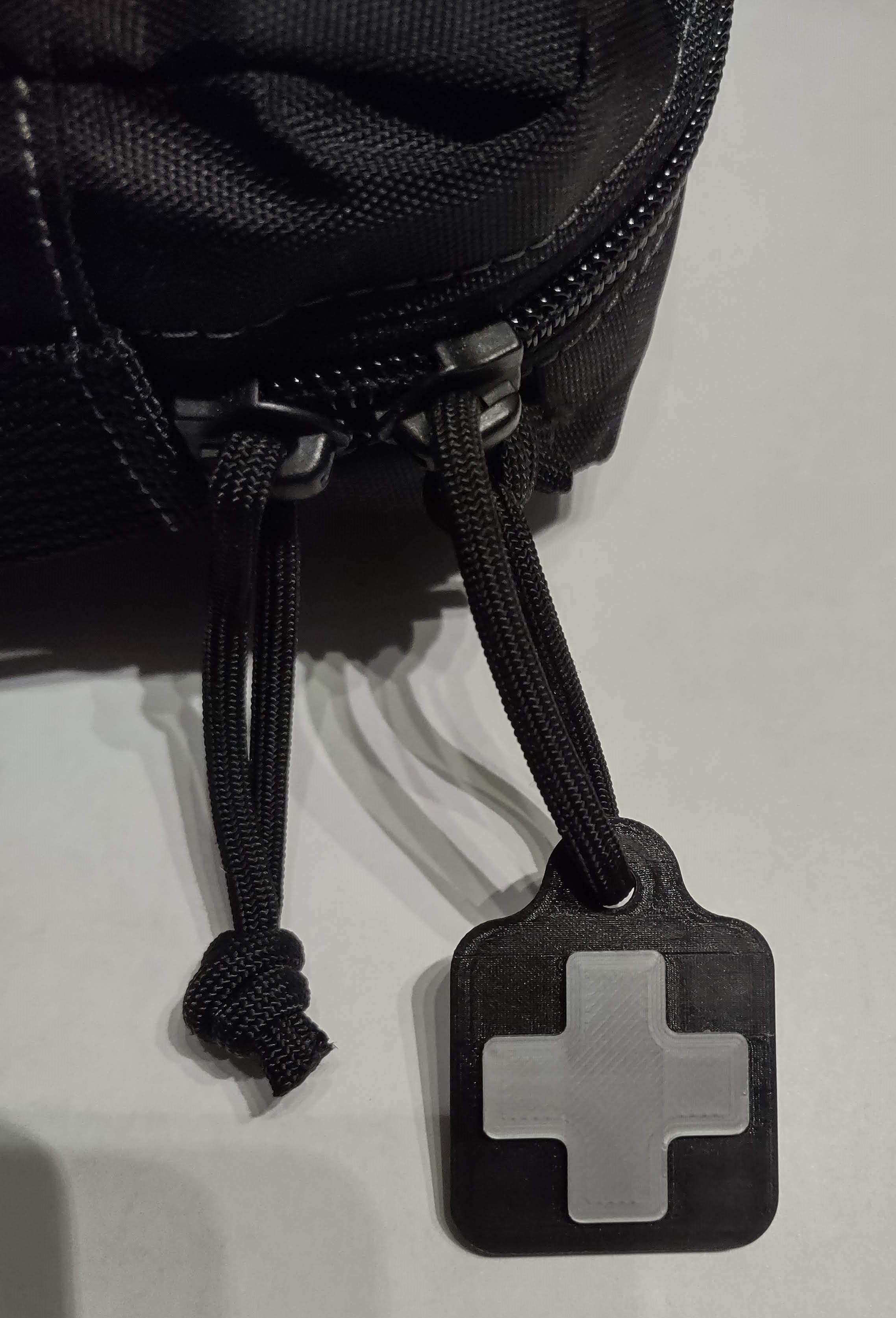 First Aid Zipper Tag by Max R | Download free STL model | Printables.com