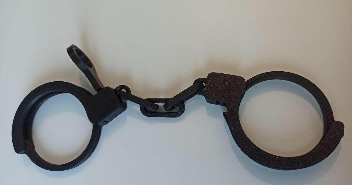 Print-in-place handcuffs by Maciek | Download free STL model ...