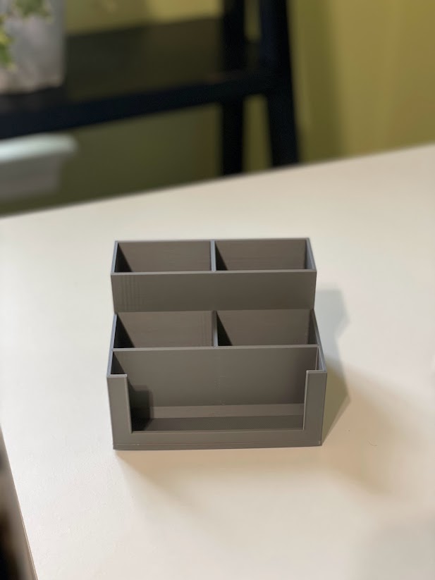 Simple remote control caddy with phone stand. Two sizes. von Vikas ...