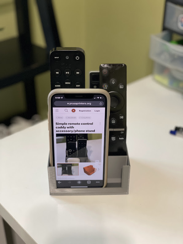 Simple remote control caddy with phone stand. Two sizes. von Vikas ...
