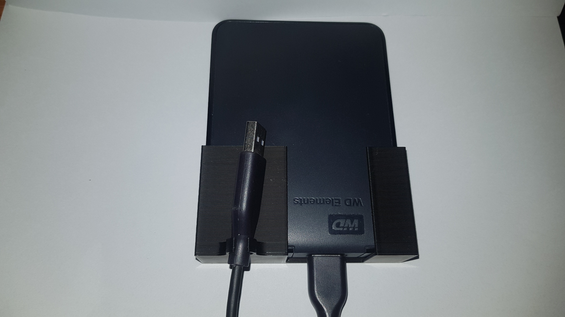 hdd wall holder 2,5" by llangoss | Download free STL model | Printables.com