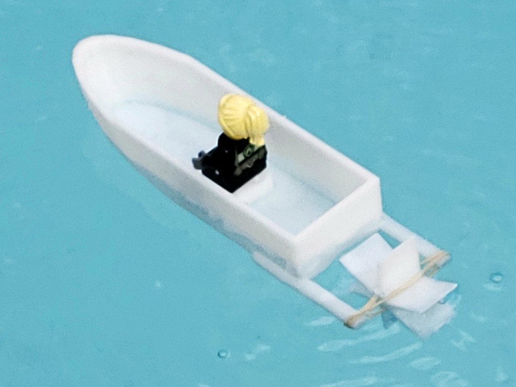 Rubber-band powered paddle boat with Lego seat by Anachronist ...