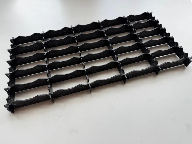 Parametric laser cutting grid (from recycled prints) by Dodo Designs ...