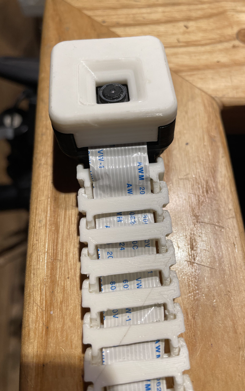 Cable chain connection for articulating Raspberry Pi camera by Thijs ...