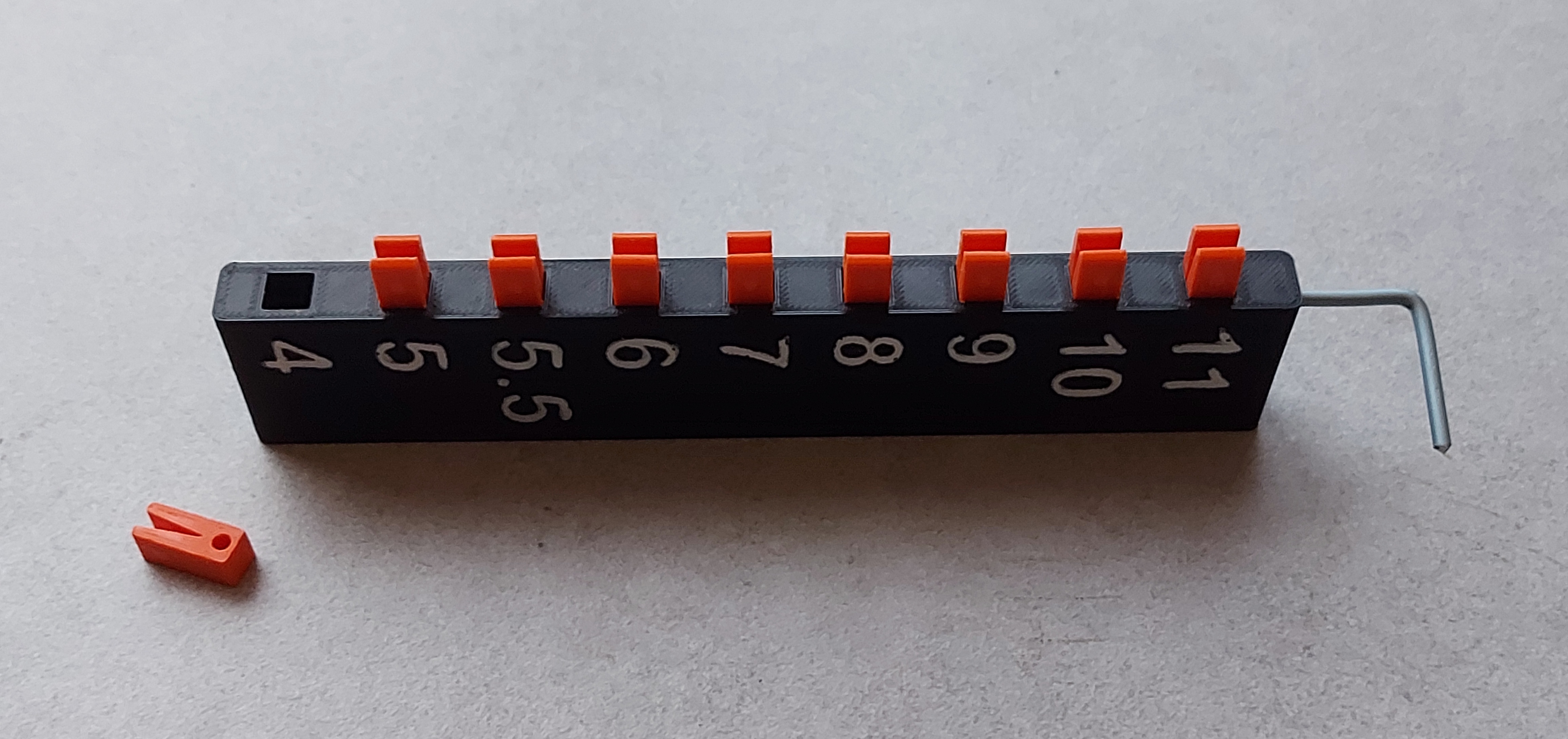 Modular ratchet socket holder for 1/4" square sockets. Replaceable ...