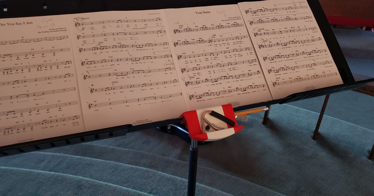Guitarist capo and pencil holder on a music stand by Usman Suriono ...