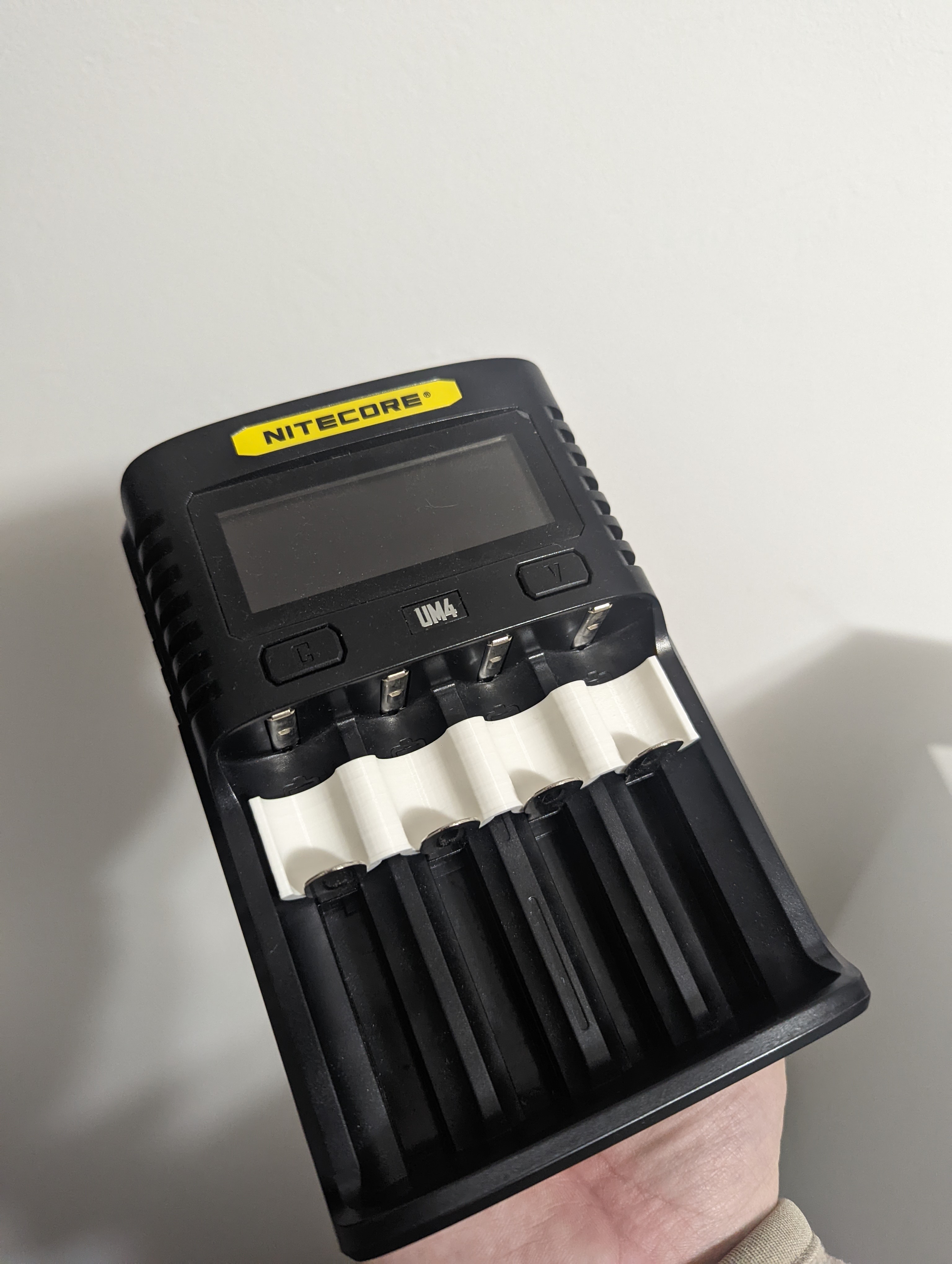 Nitecore charger - AA riser by Saow | Download free STL model ...
