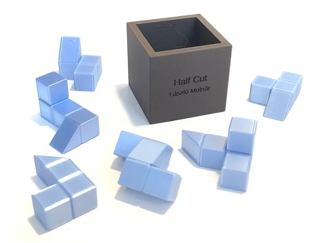 Half Cut - Packing puzzle by László Molnár by Printable Puzzle Project ...