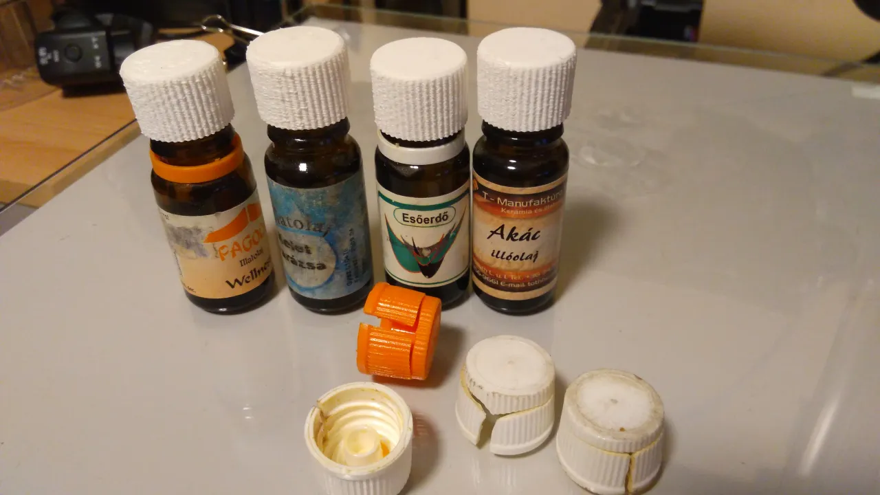 Essential oil bottle cap by DVS | Download free STL model | Printables.com