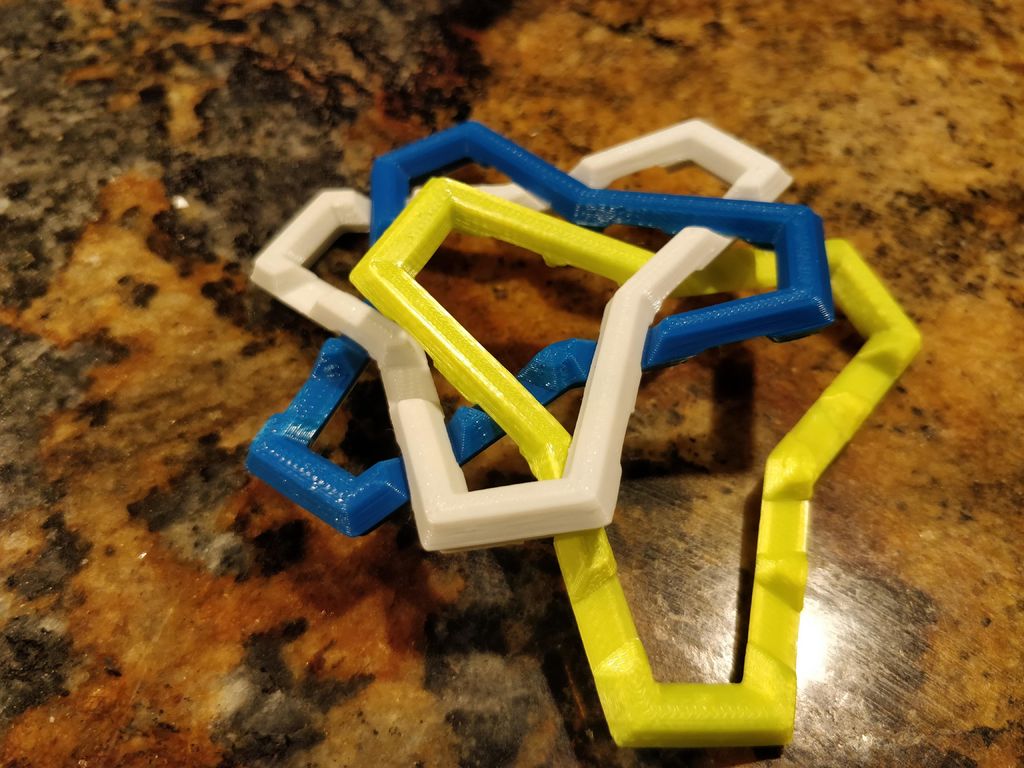 Multi-Material Interlocking Rings Puzzle by AbeFM | Download free STL ...