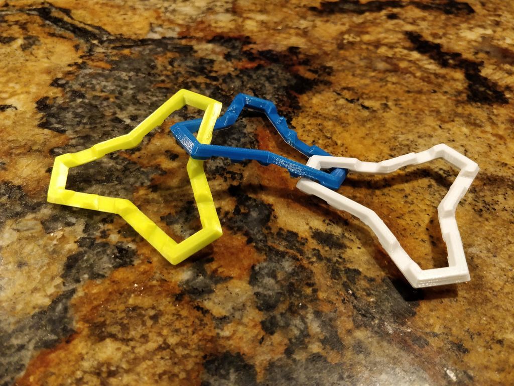 Multi-Material Interlocking Rings Puzzle by AbeFM | Download free STL ...