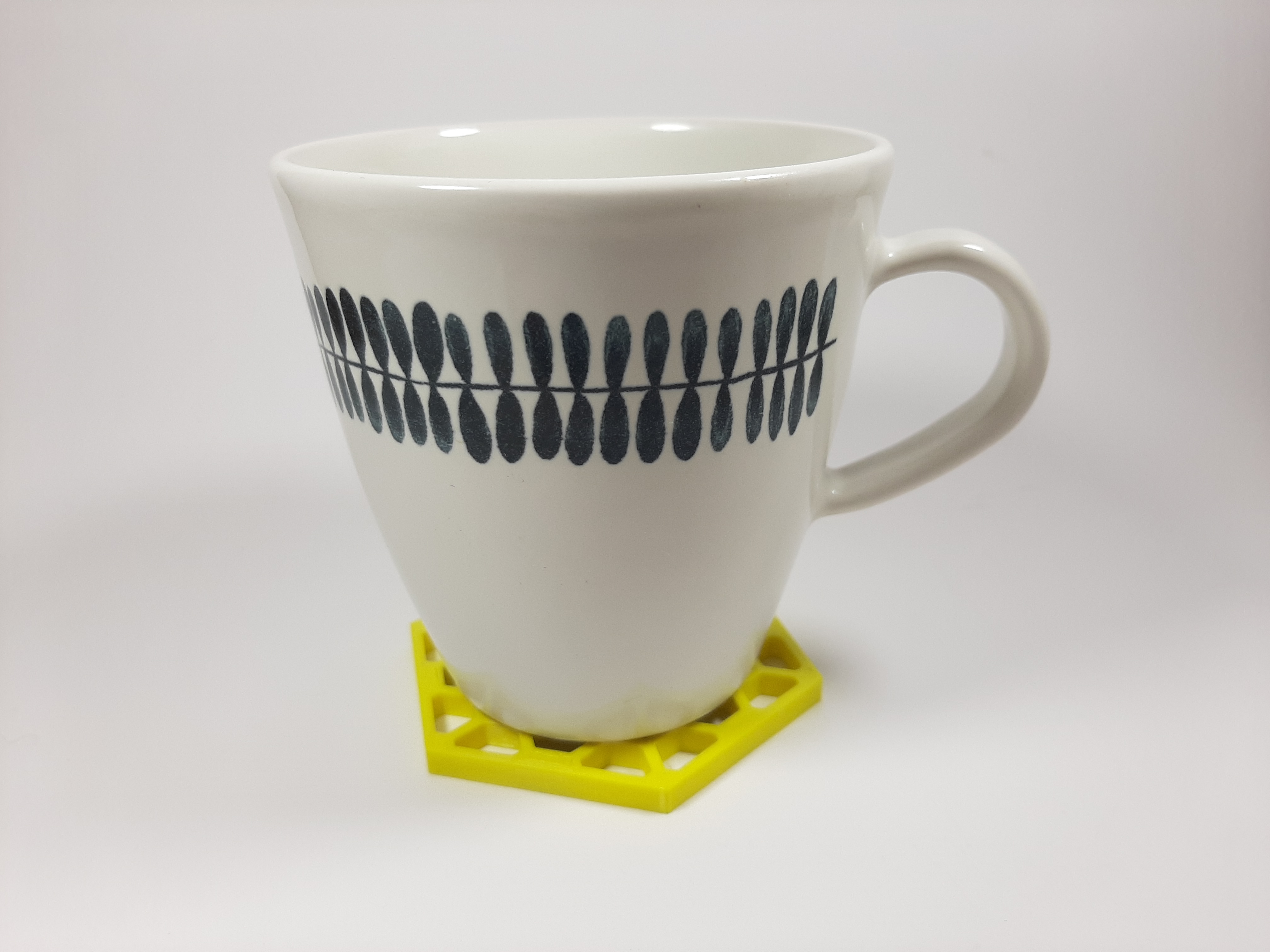 Coaster With Hexagonal Pattern & Dispenser by Ordinary Contraptions ...