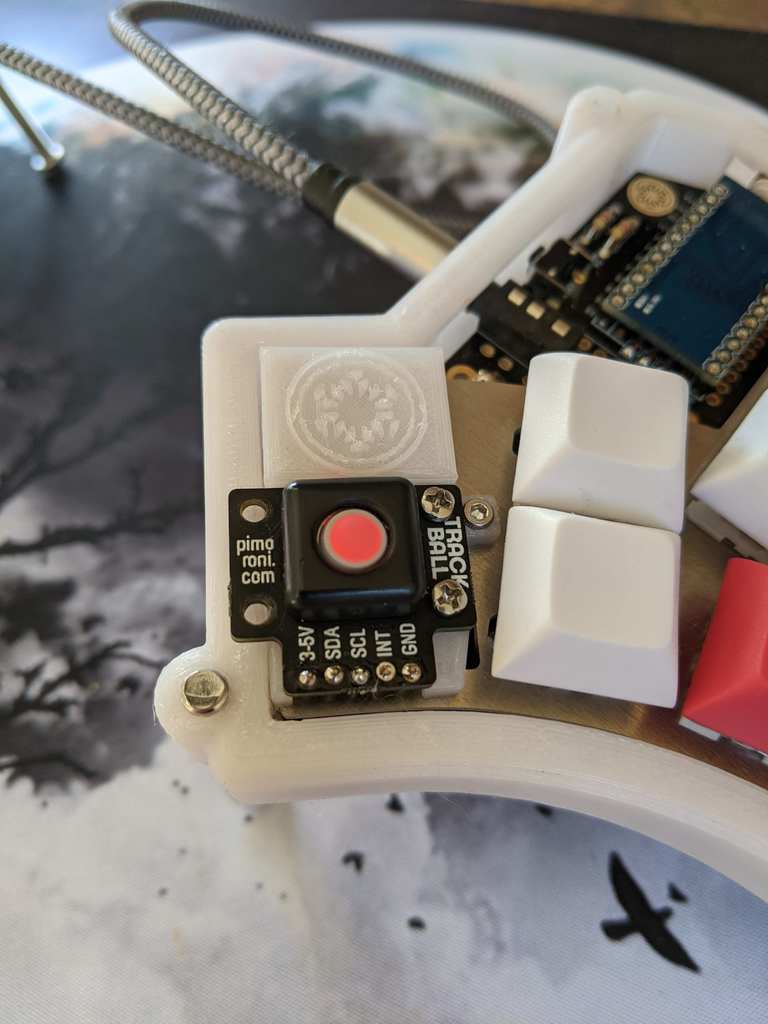 Kyria Pimoroni Trackball Mount by archaicWinter | Download free STL ...