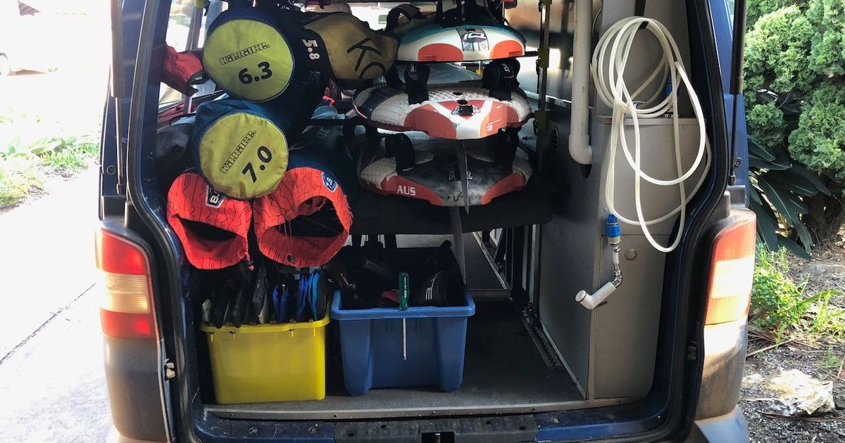 Fully adjustable, quickly removable, low profile van rack for ...