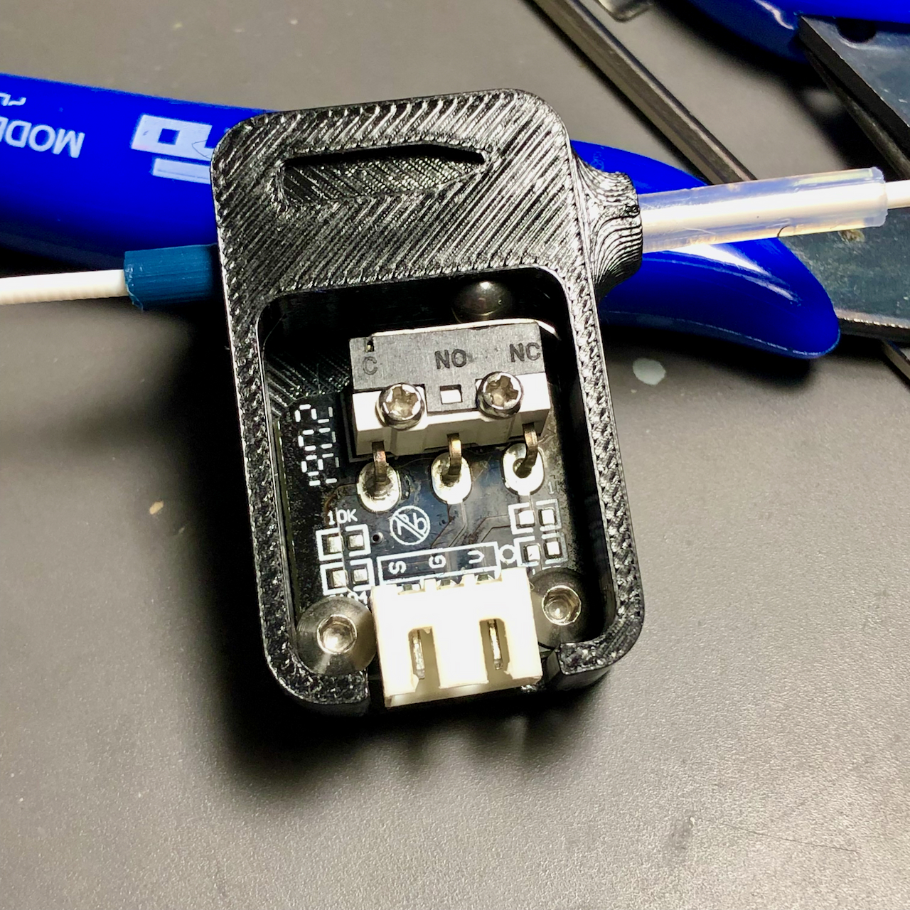 Simple filament runout sensor (using Ender 3 endstop switch) von David Relich | Kostenloses STL ...