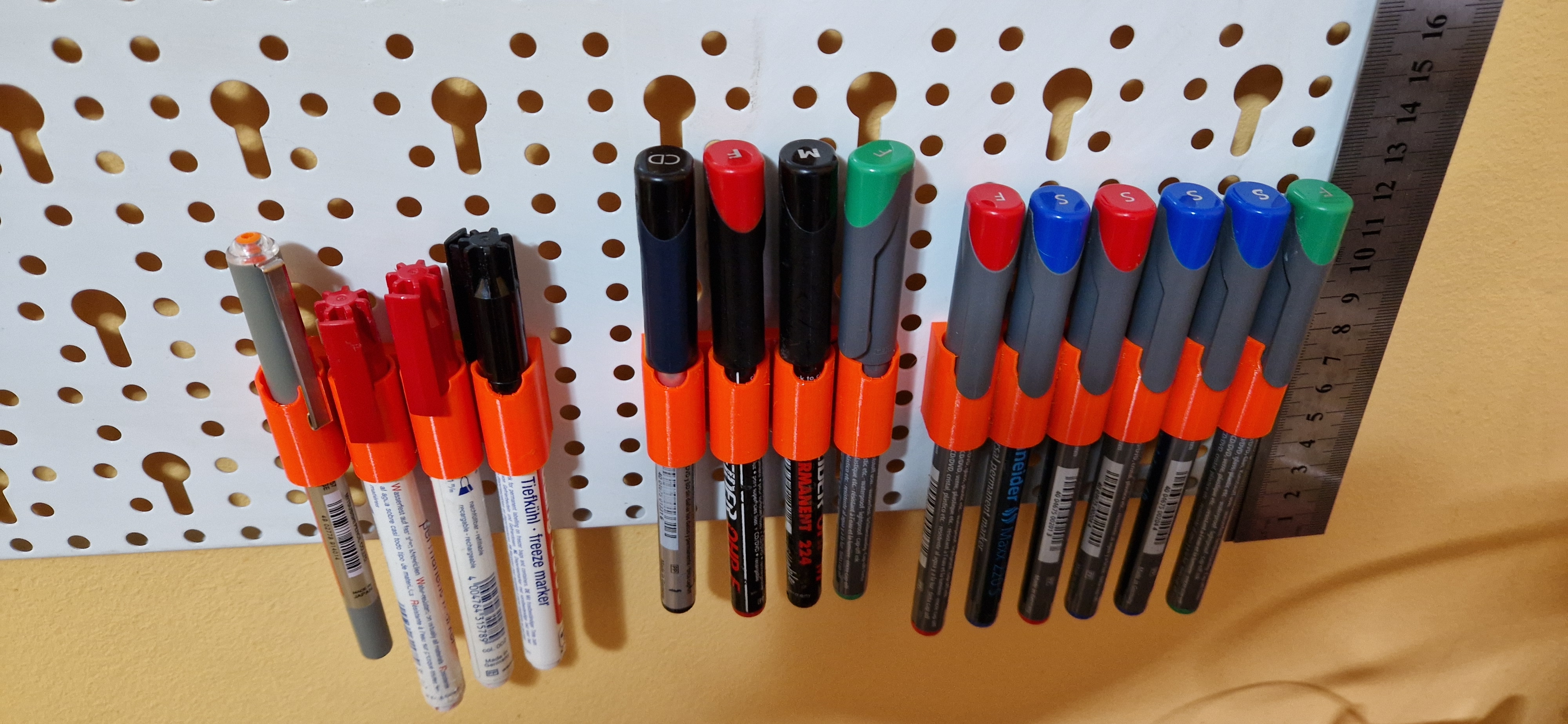 Euro-Tegometall pegboard with keyhole pattern by Alexandru Hauzman ...