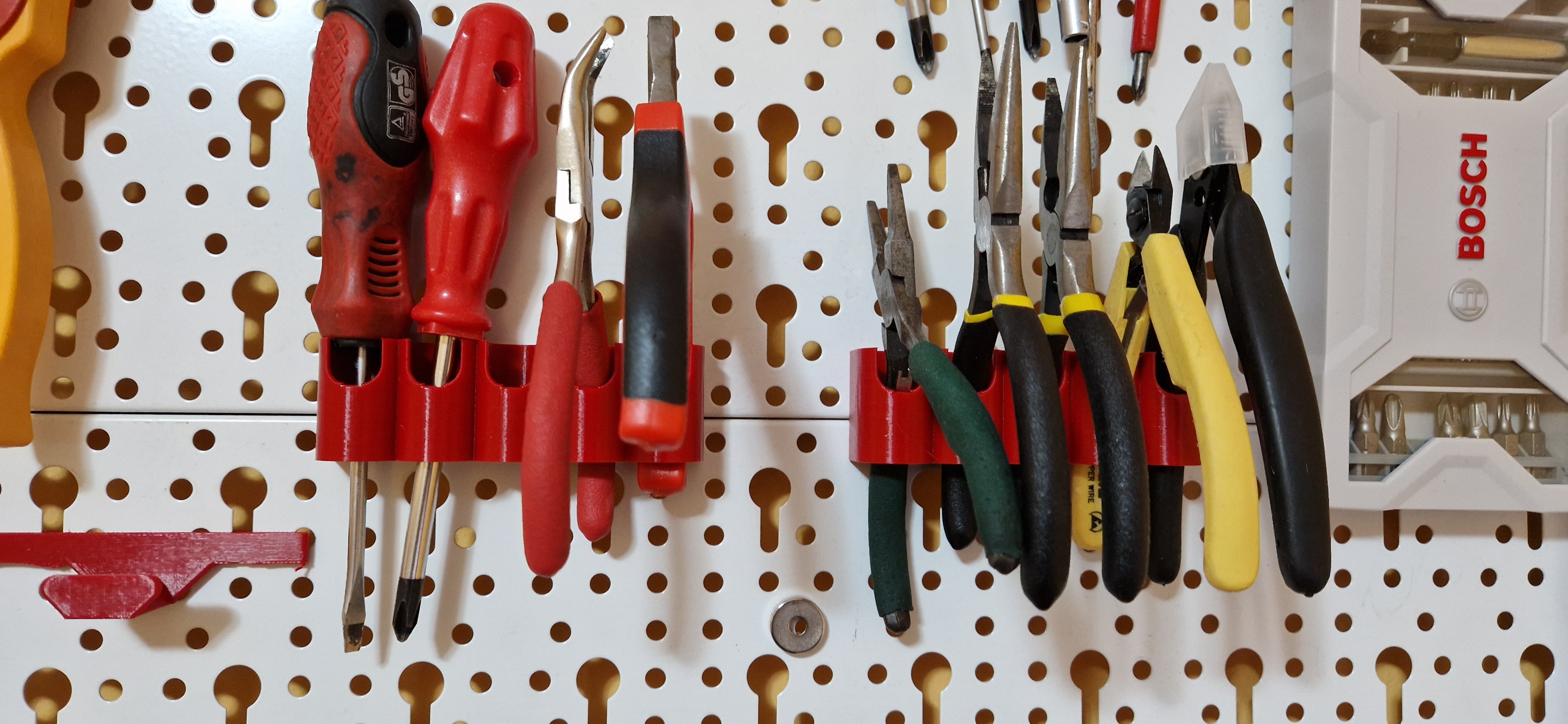 Euro-Tegometall pegboard with keyhole pattern by Alexandru Hauzman ...