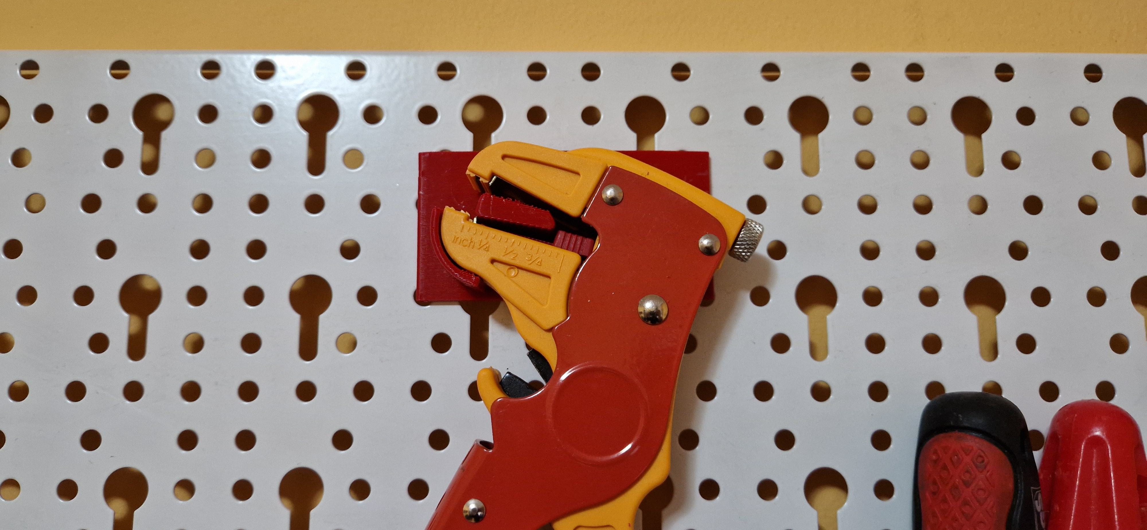 Euro-Tegometall pegboard with keyhole pattern by Alexandru Hauzman ...