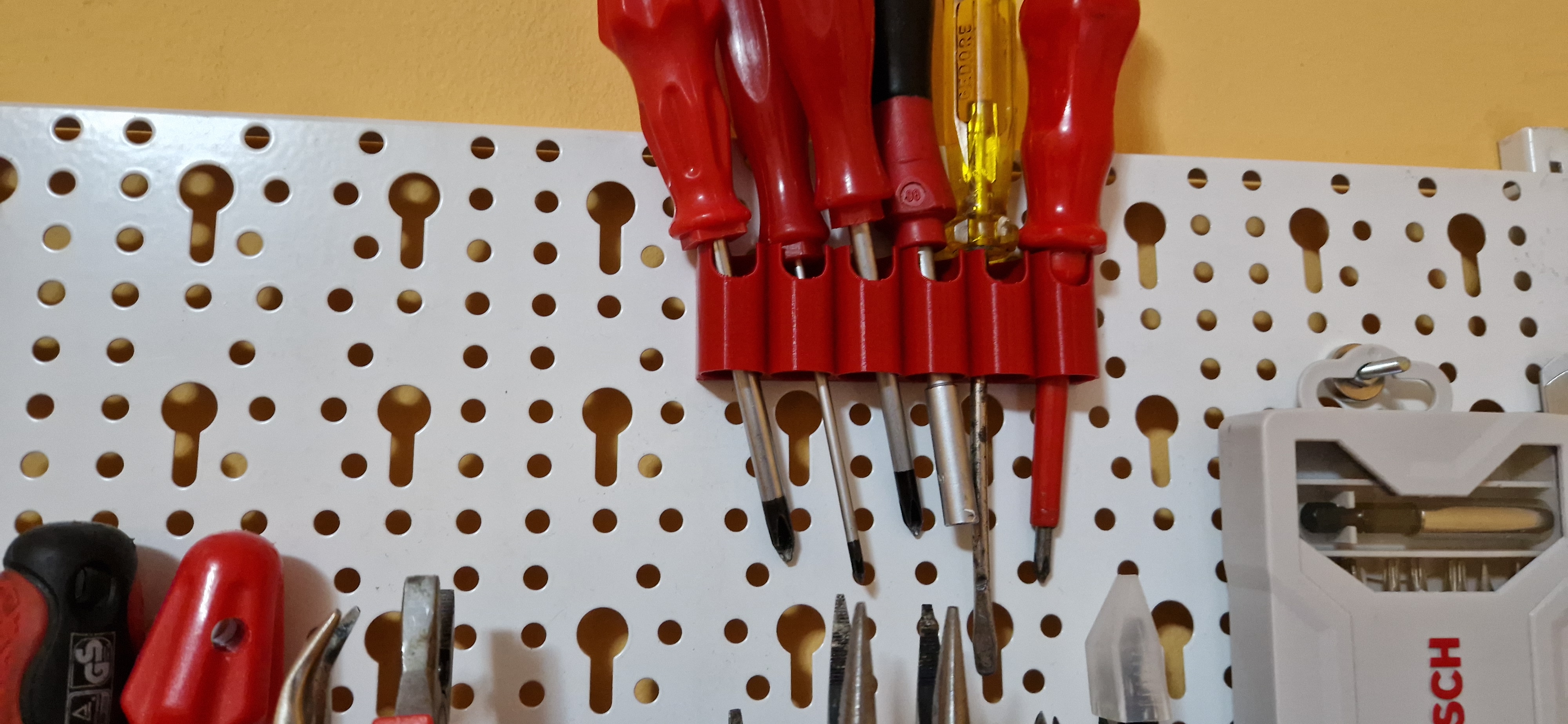 Euro-Tegometall pegboard with keyhole pattern by Alexandru Hauzman ...