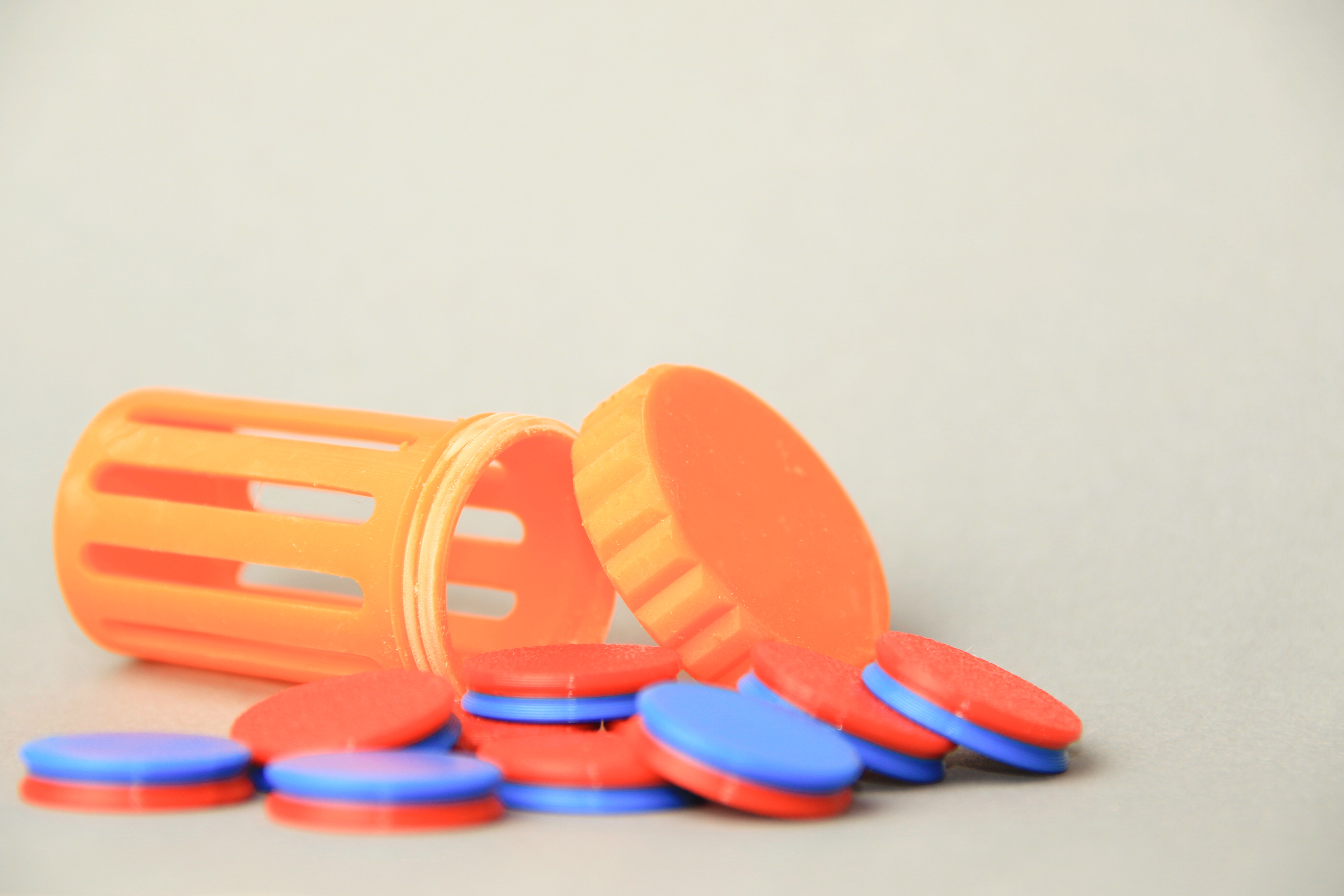 Two colored chips and container for school kids to learn math by ...