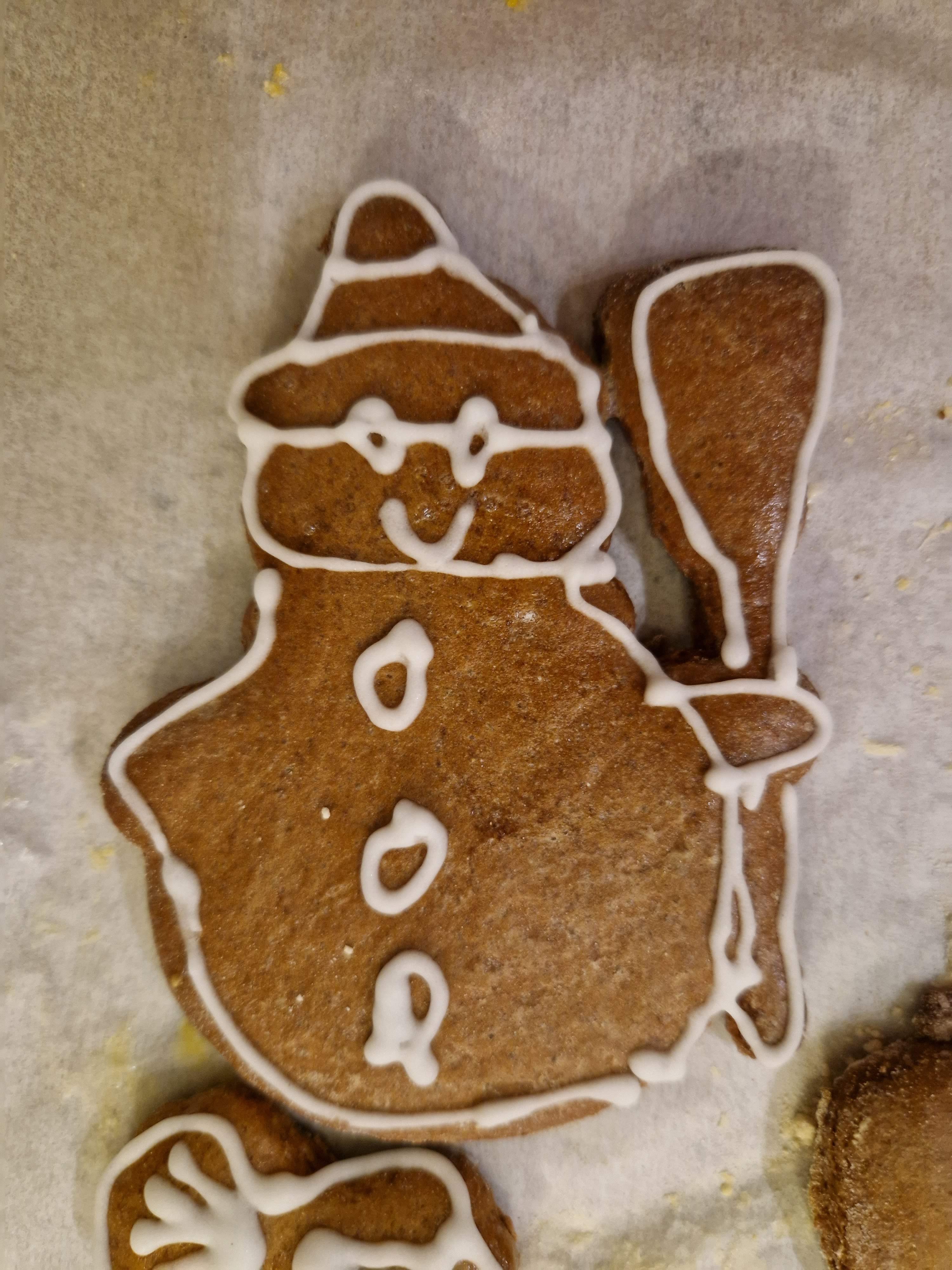 Cookie cutter in the shape of a snowman with a broom by Ondra ...