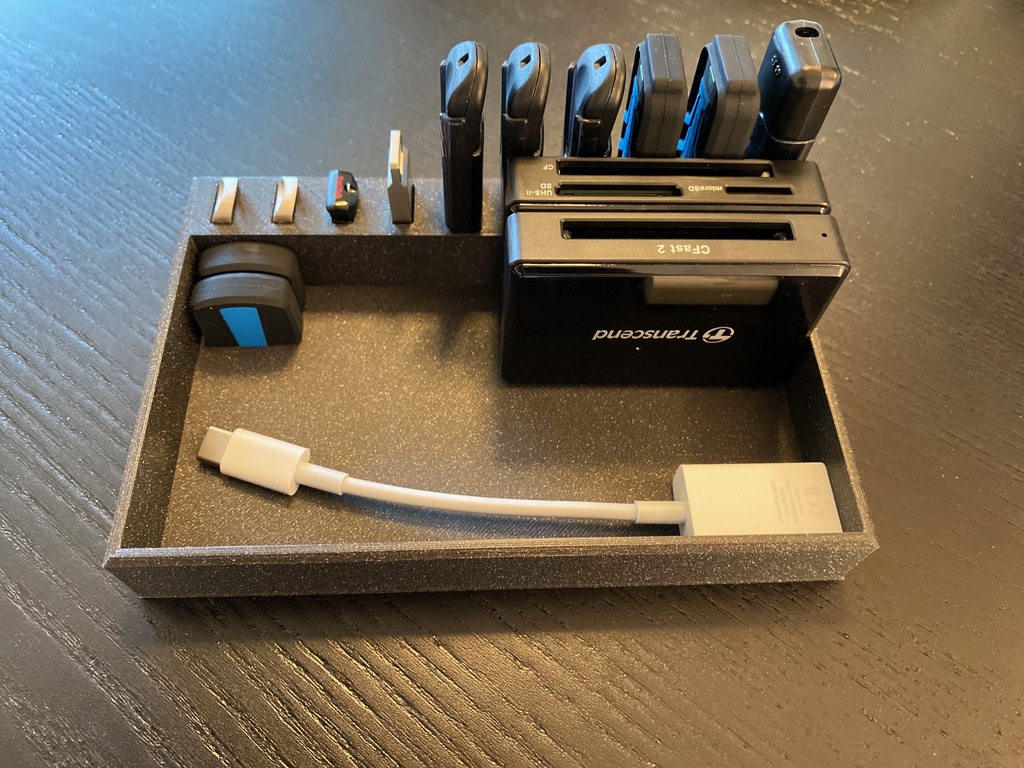 USB stick storage holder with extra space for caps and other equipment ...