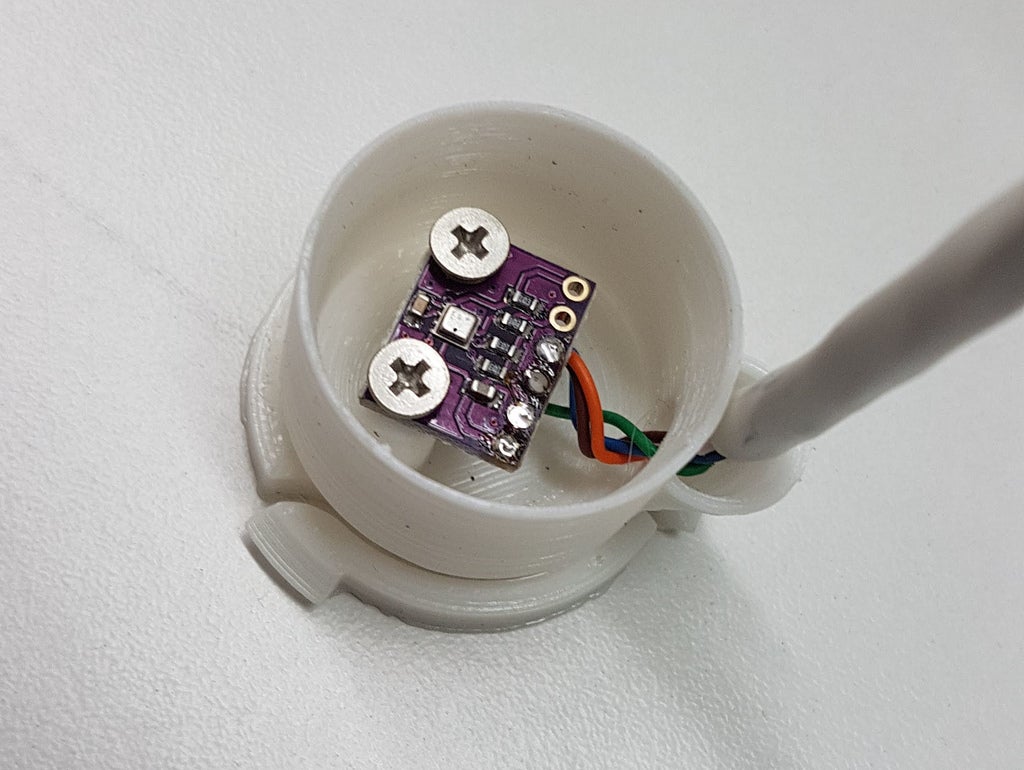 Helical rain/radiation shield for weather sensors with sensor mounting ...