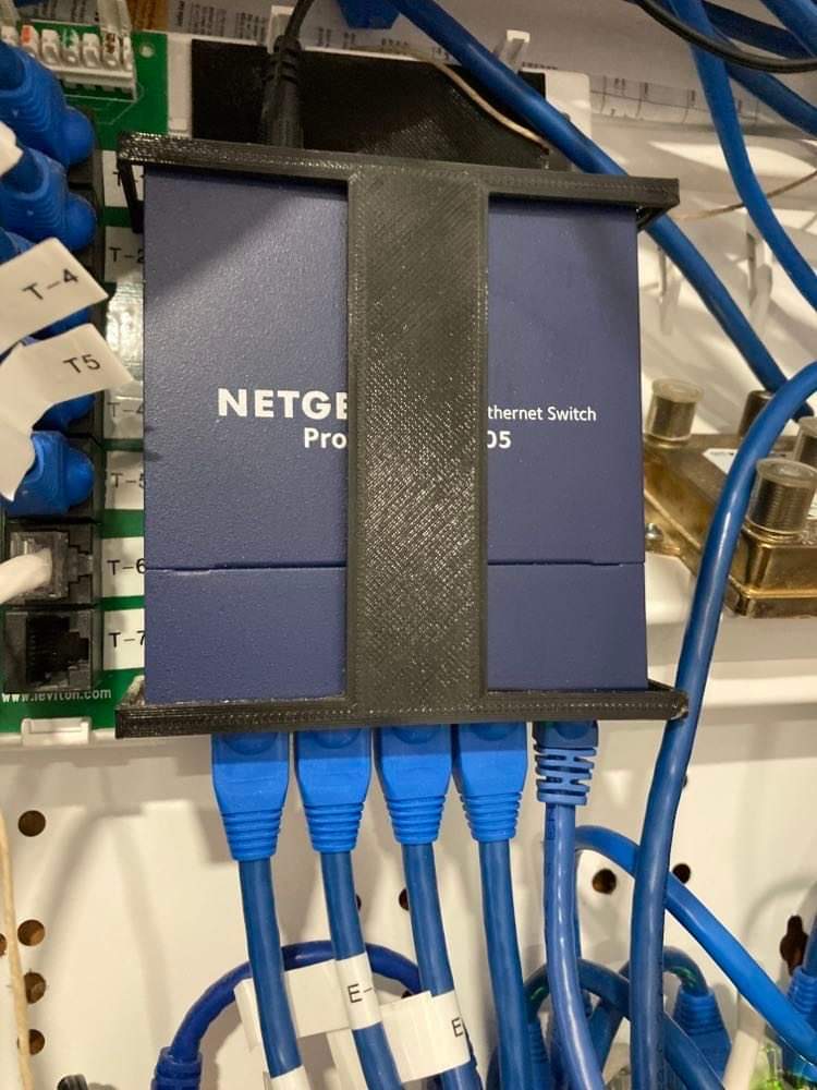 Netgear FS105 Holder by stevendpclark | Download free STL model ...