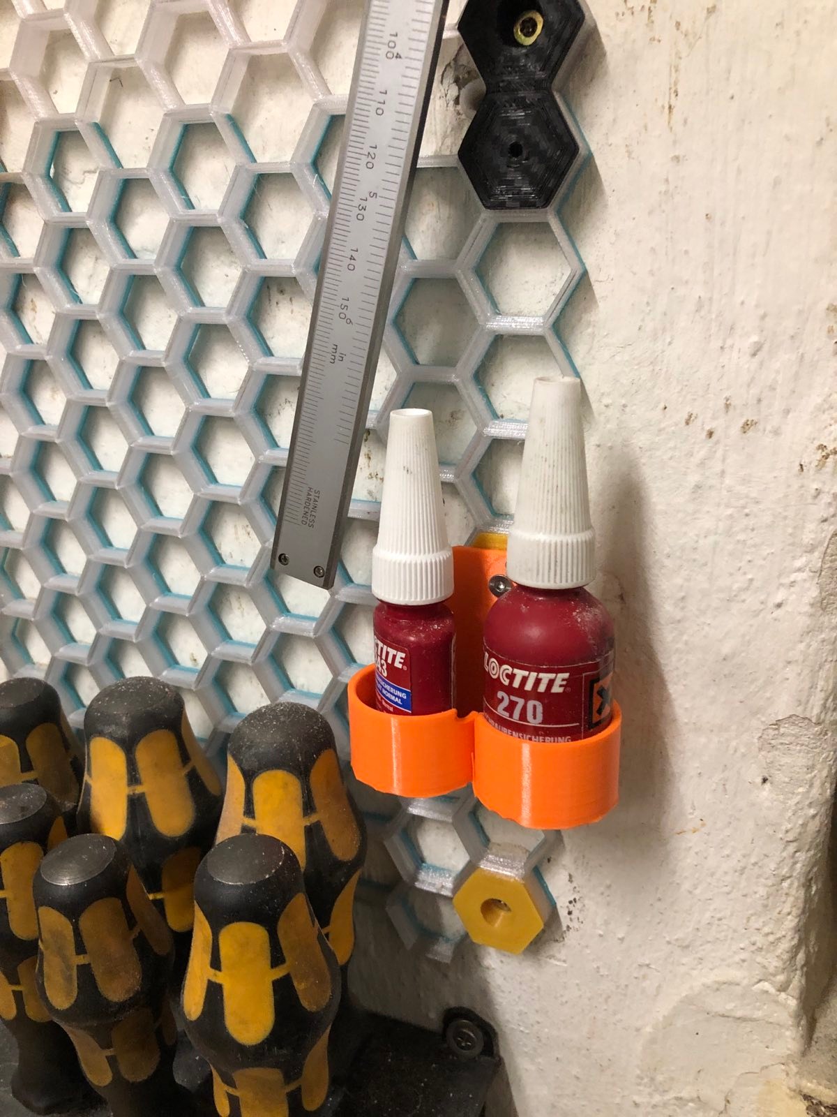 Loctite Bottle Holder Honeycomb Storage Wall by Diego E. | Download free STL model | Printables.com