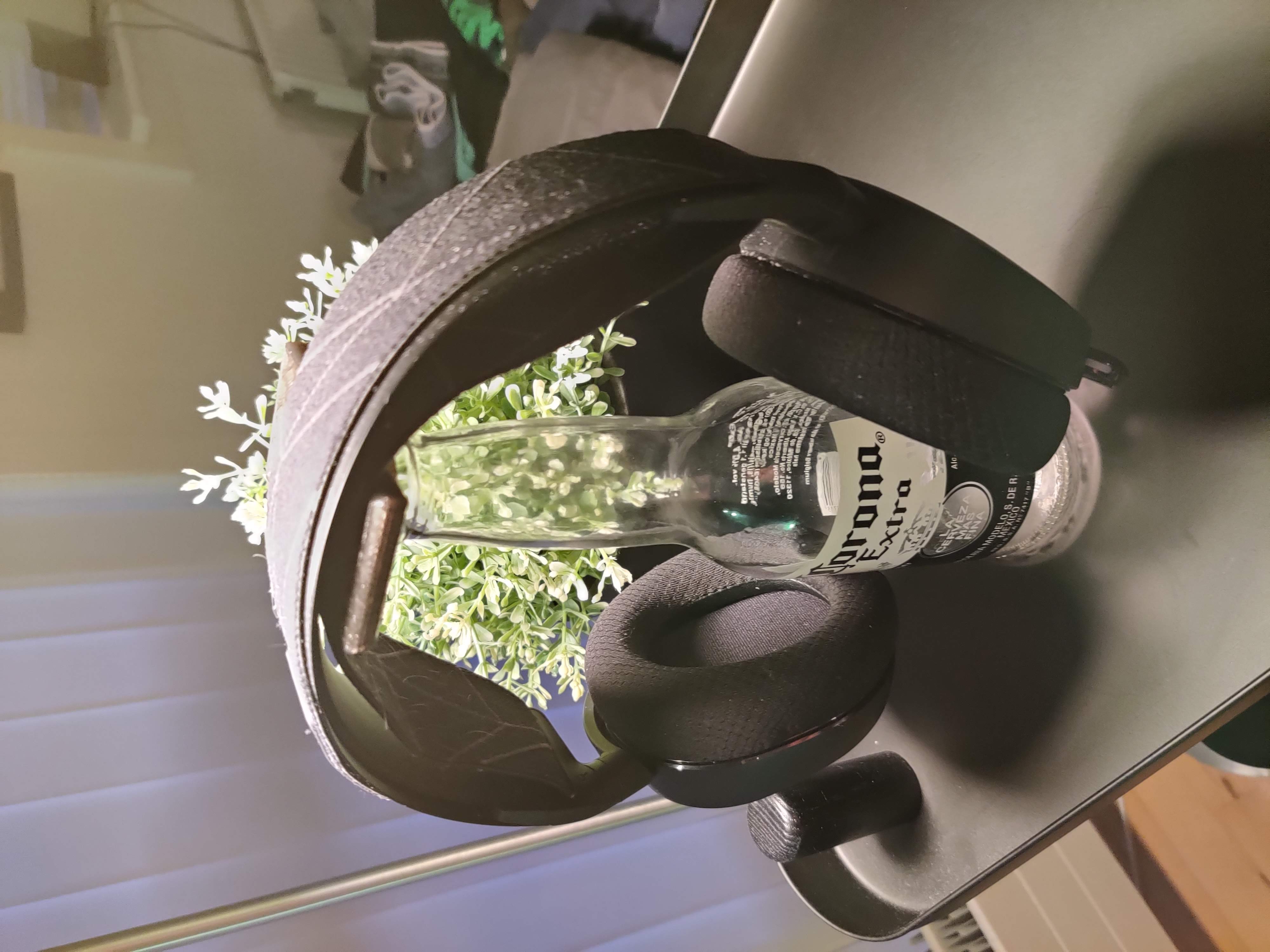 Corona beer bottle "upcycled" as headphone holder by Von Plaf ...