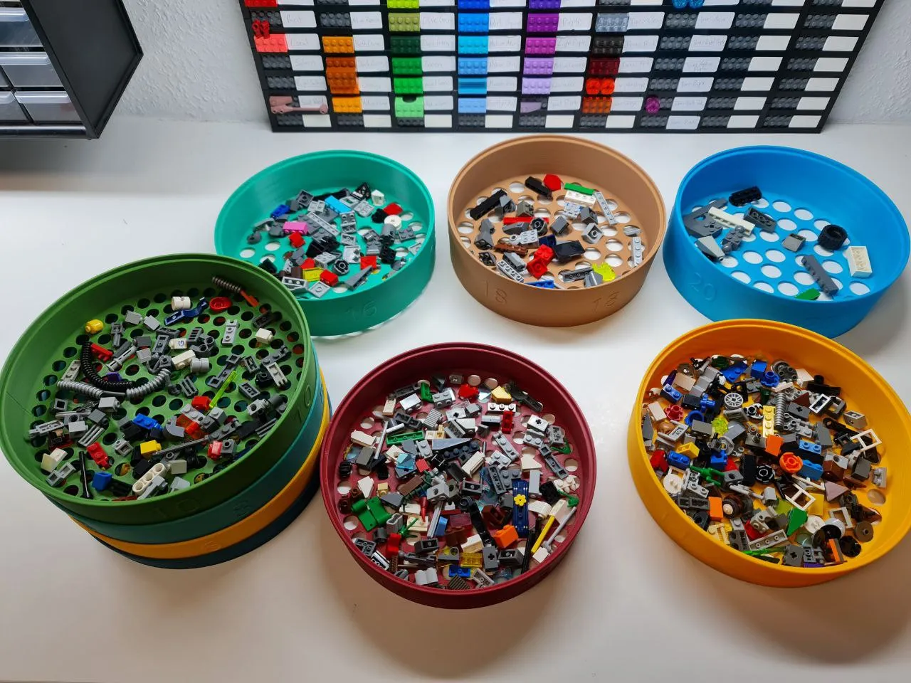 Stackable sorting tower with sieve inserts in different sizes by ...