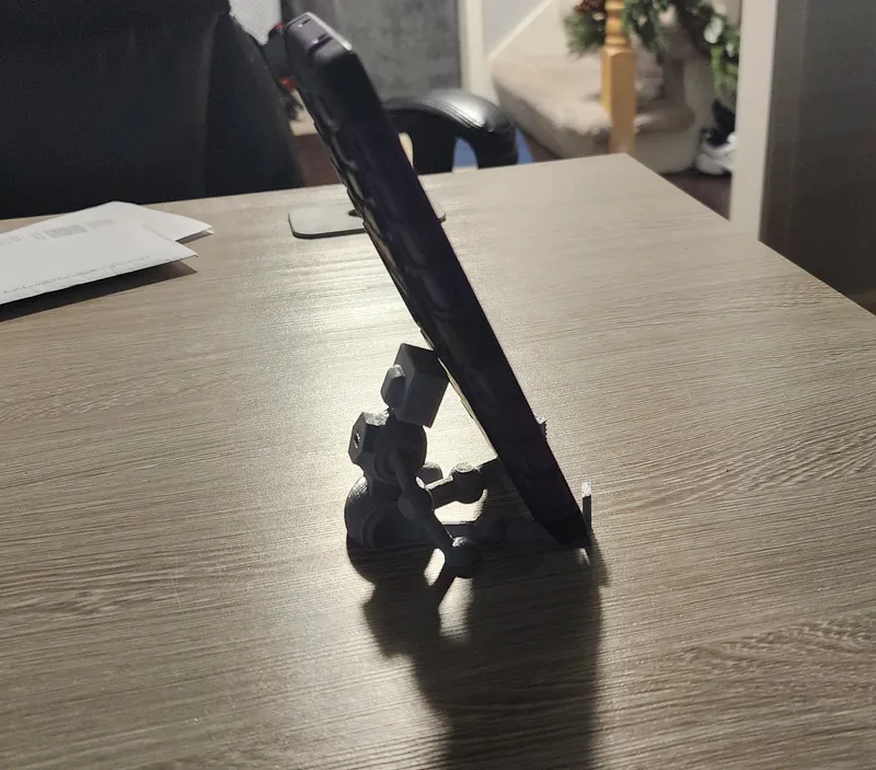 Tired Bot Phone & Tablet Stand by Triple G Workshop | Download free STL ...