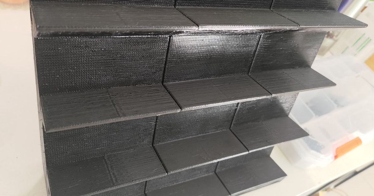 Storage rack for long cylindrical objects that may have a flared base ...