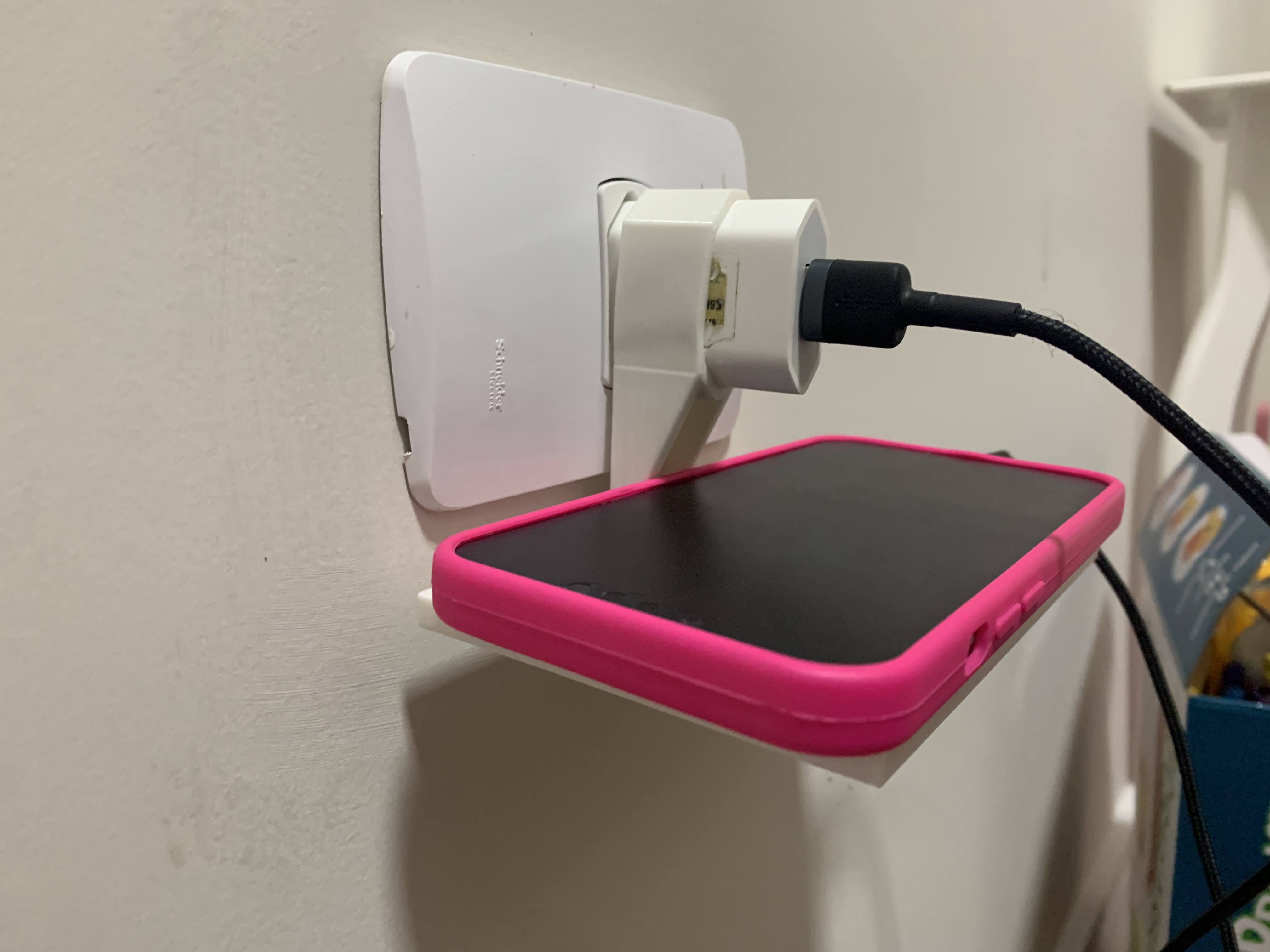 Horizontal smartphone charger holder by Baddan | Download free STL ...