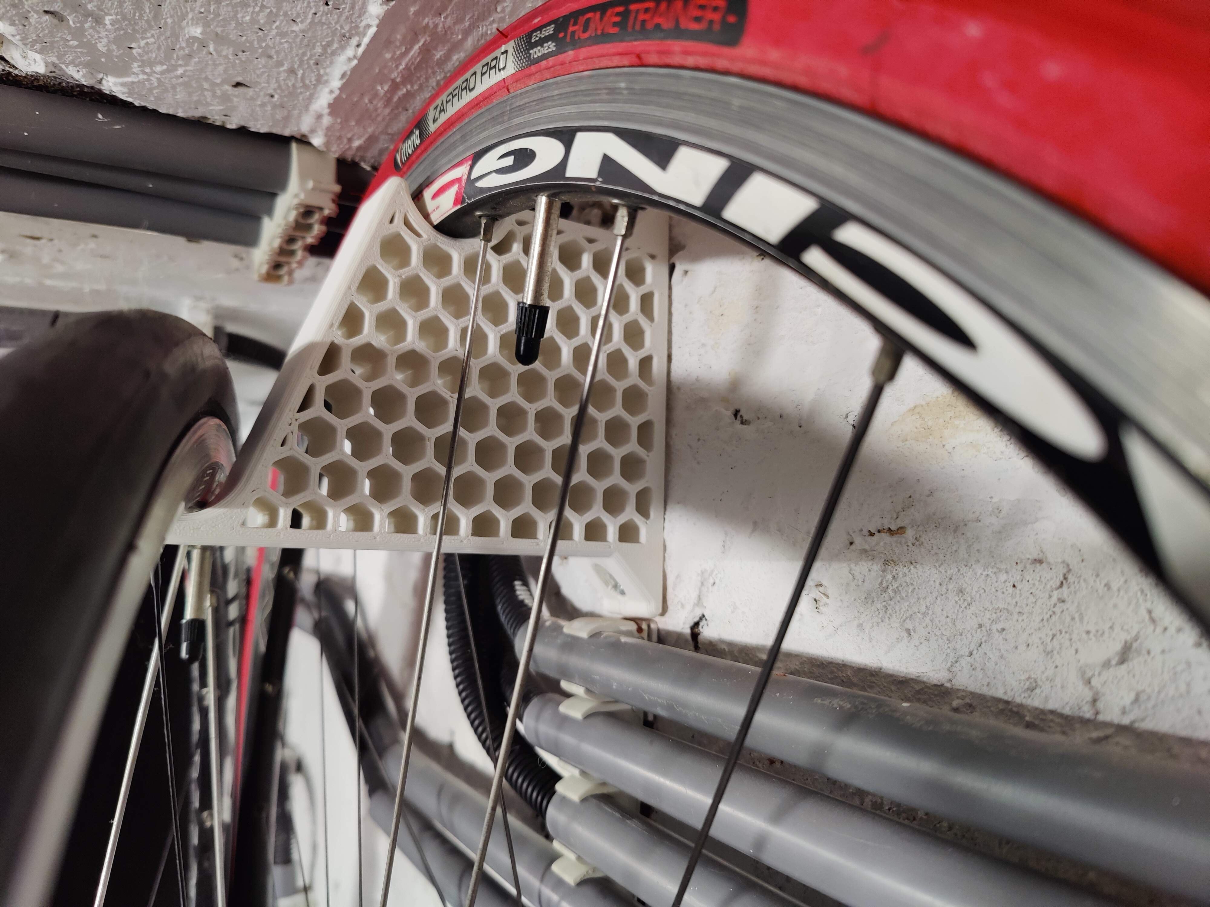 Sturdy bicycle wheel wall support by La Cave Au Chat | Download free ...