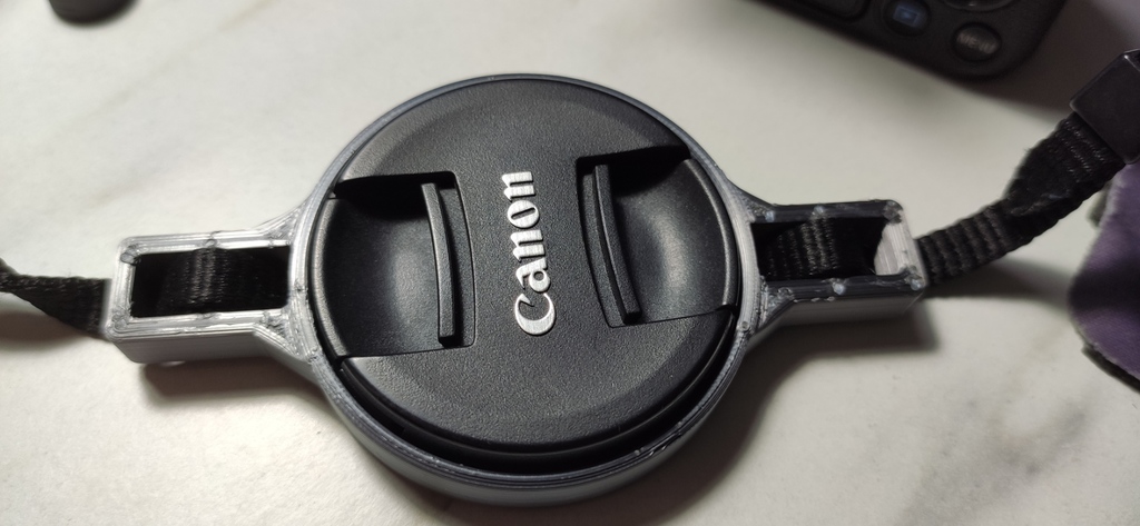 Canon M50 Stock Lens Cap 49mm Holder by yong3dprint | Download free STL ...