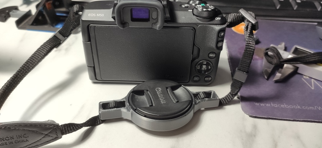 Canon M50 Stock Lens Cap 49mm Holder by yong3dprint | Download free STL ...